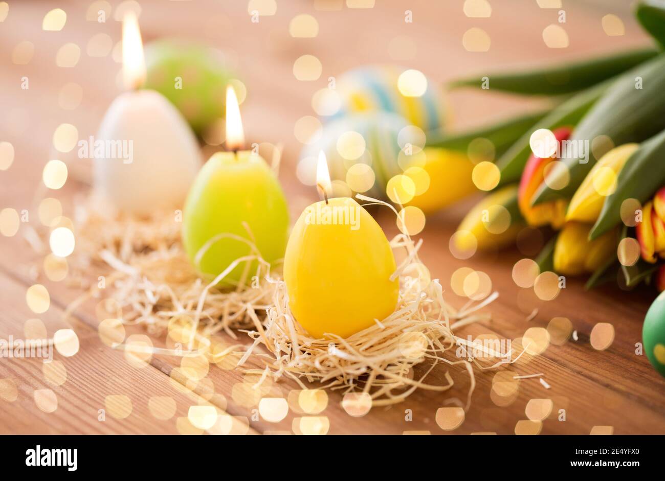 Three burning candles spring hi-res stock photography and images - Alamy