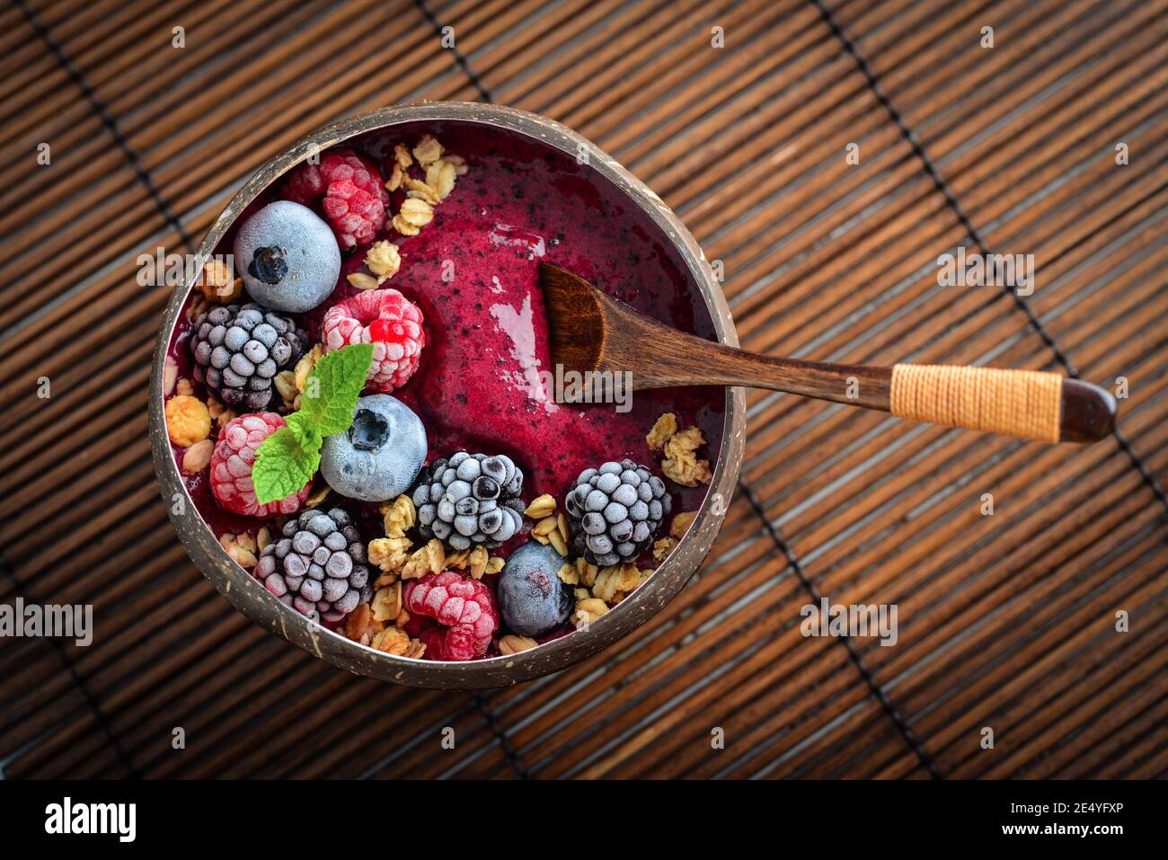 Acai smoothie bowl with blueberry, blackberry, raspberry, granola and ...