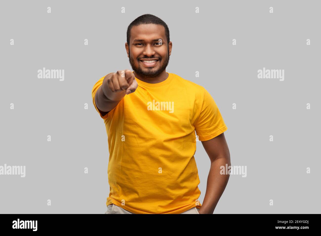 smiling african american man pointing to camera Stock Photo - Alamy
