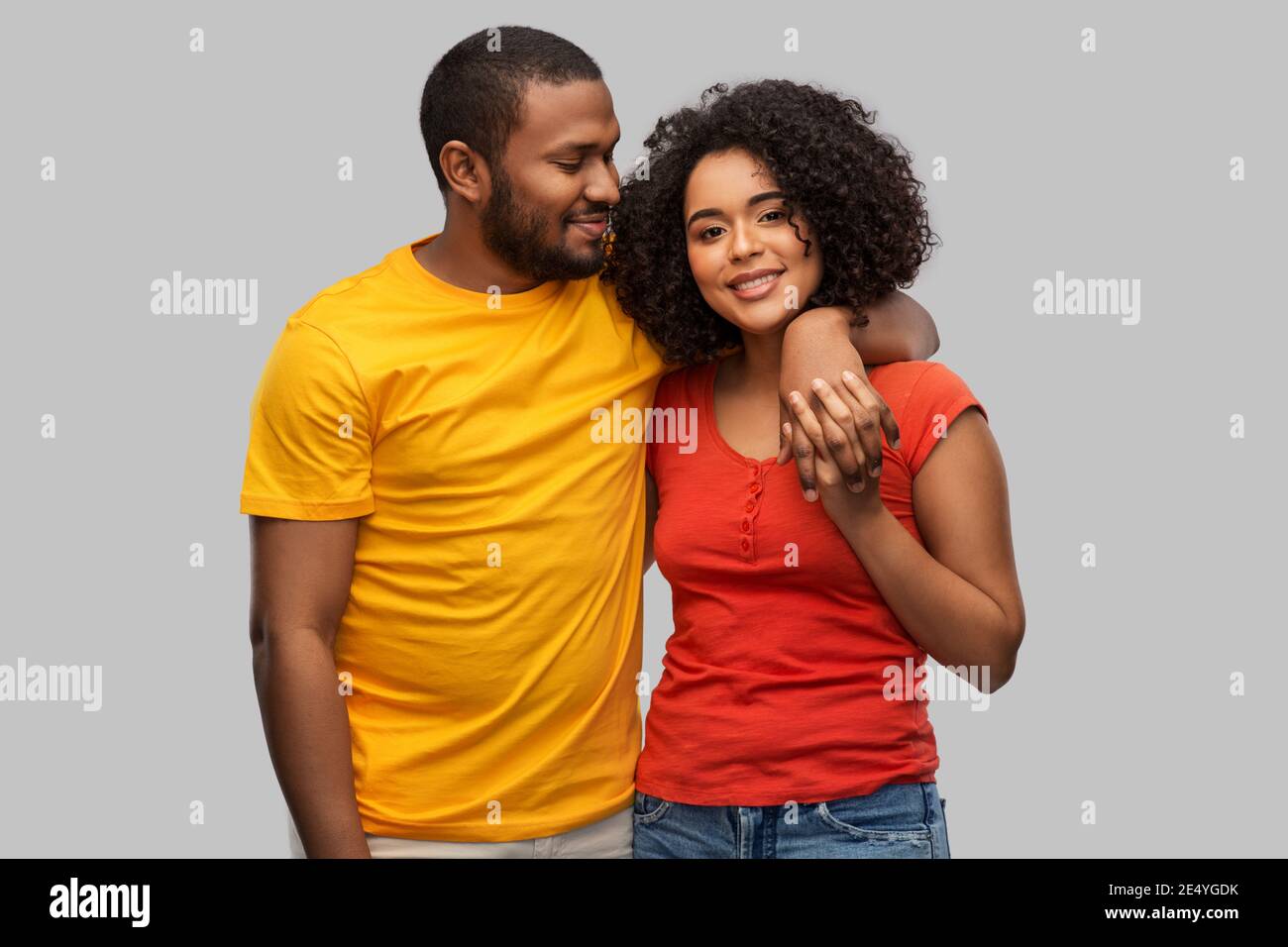 happy african american couple hugging Stock Photo - Alamy