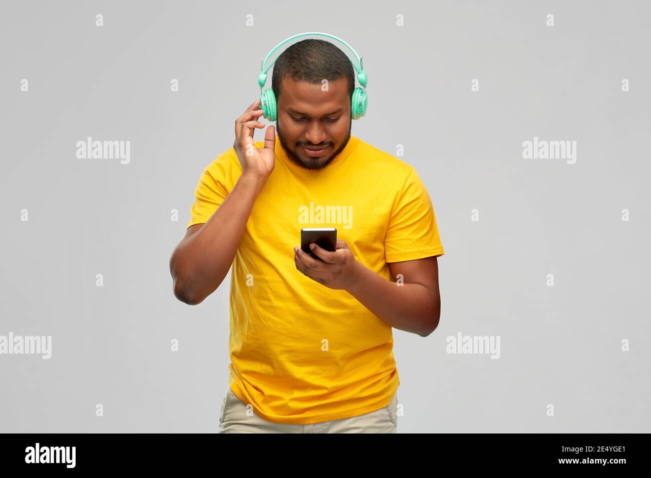 african man with headphones and smartphone Stock Photo - Alamy