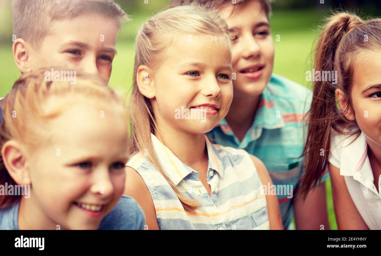 group of happy kids or friends outdoors Stock Photo - Alamy