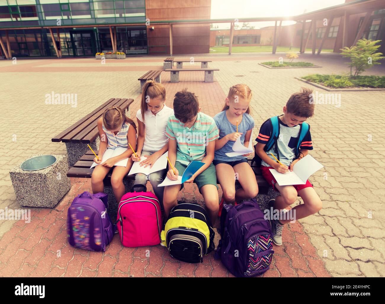 group of happy elementary school students outdoors Stock Photo - Alamy