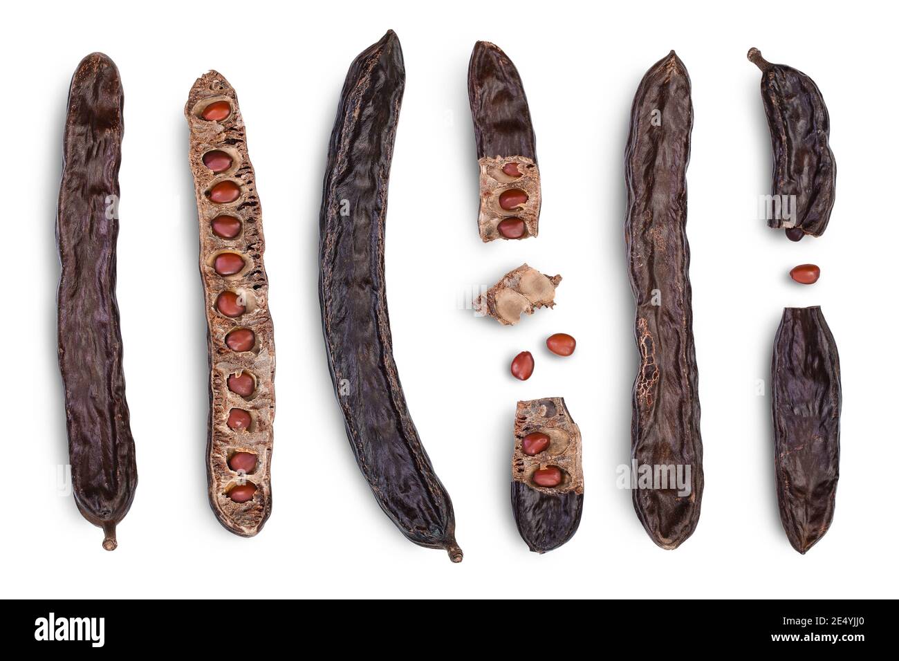 Ripe carob pods and bean isolated on white background with clipping ...