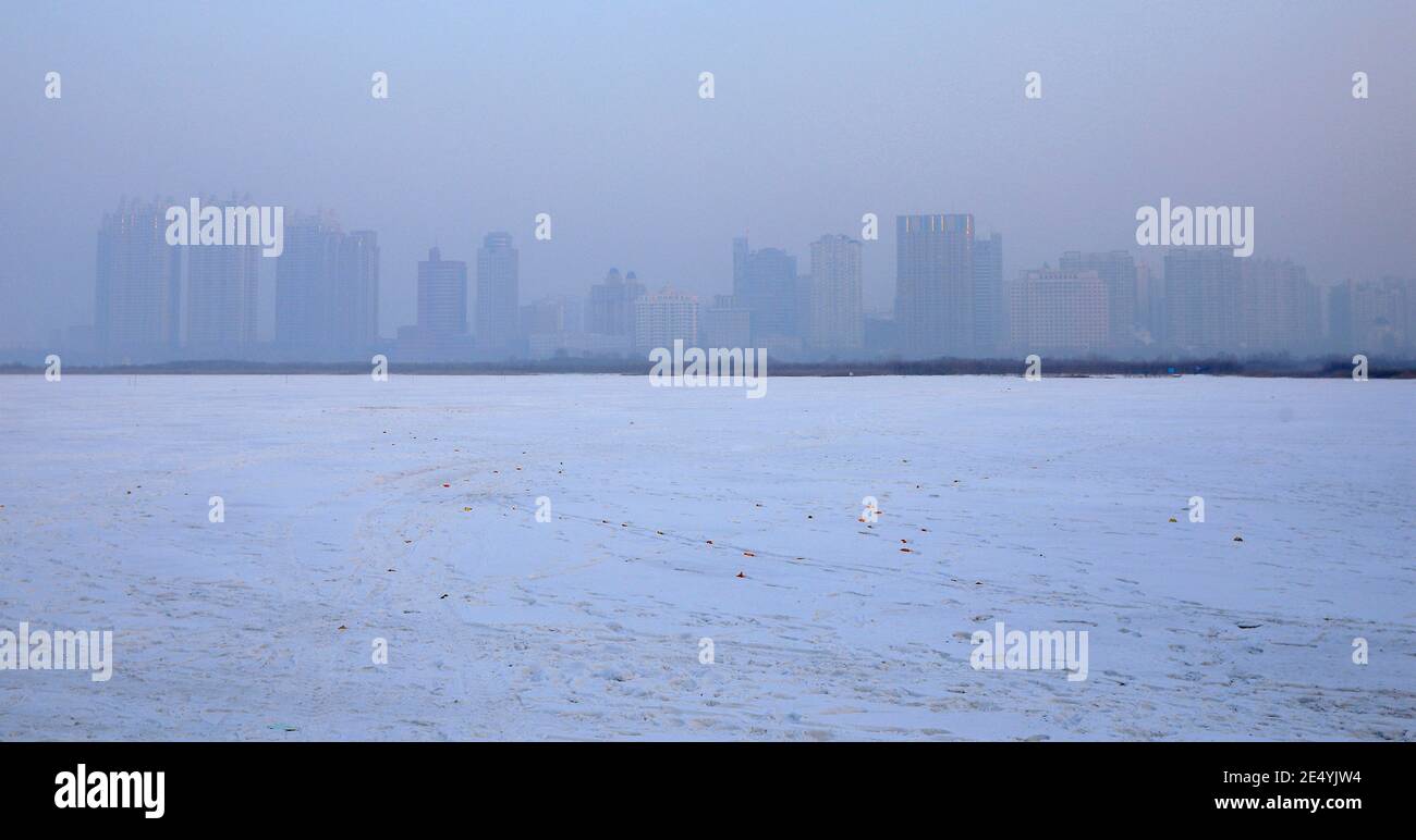 Buildings located in the downtown are covered by severe haze in Harbin ...
