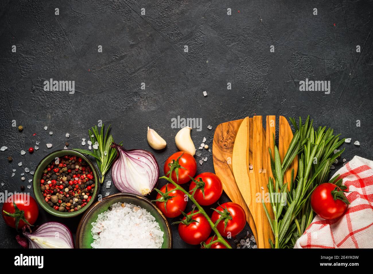 Food cooking background on black table Stock Photo - Alamy
