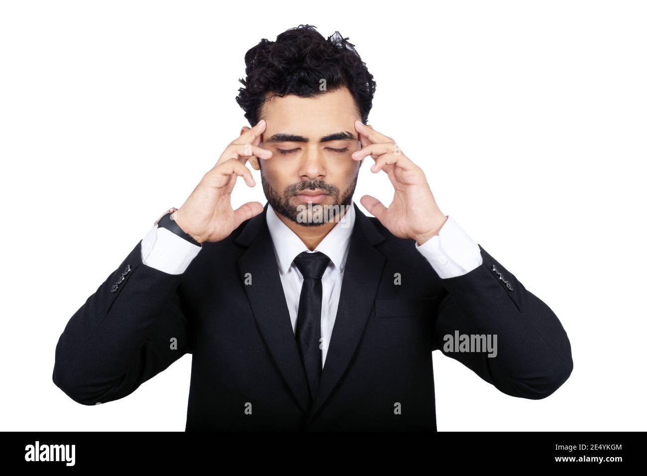 Portrait of a young Indian businessman thinking serious isolated on ...