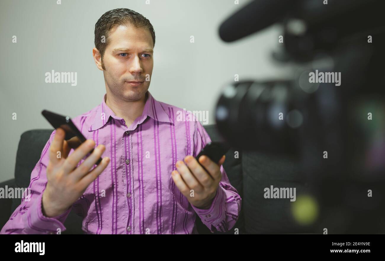 Man with recording device hi-res stock photography and images - Alamy