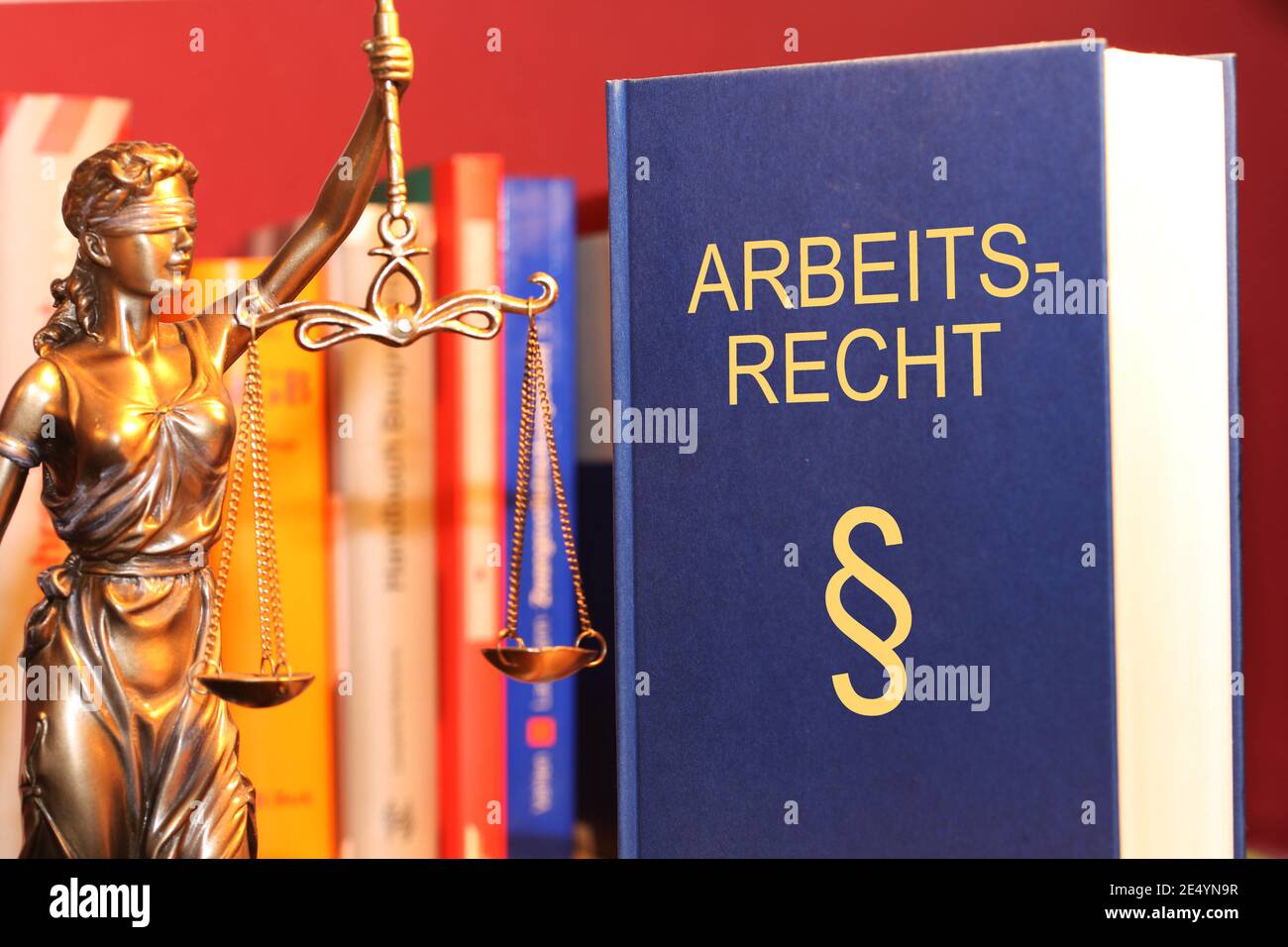 Symbol image: Reference book employment law (Arbeitsrecht) and a ...