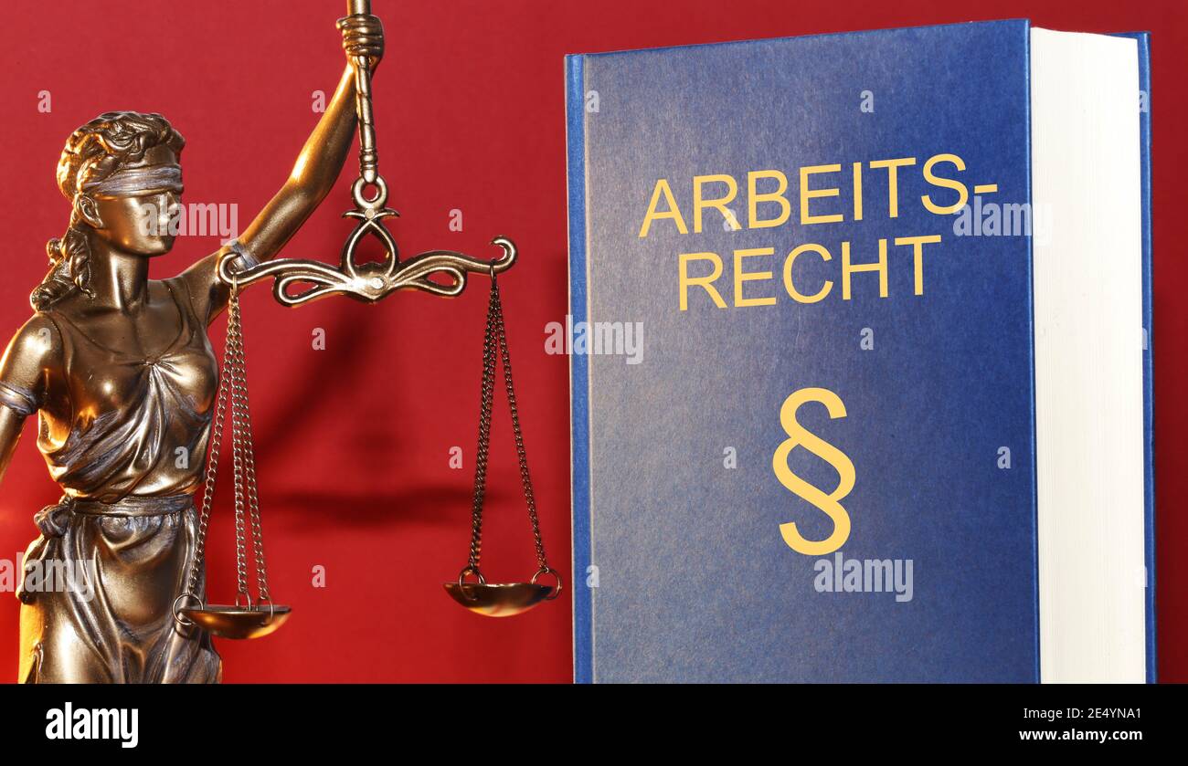Symbol image: Reference book employment law (Arbeitsrecht) and a ...