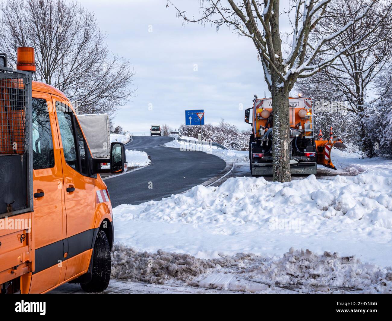 Winter service in action on the motorway in germany Stock Photo - Alamy