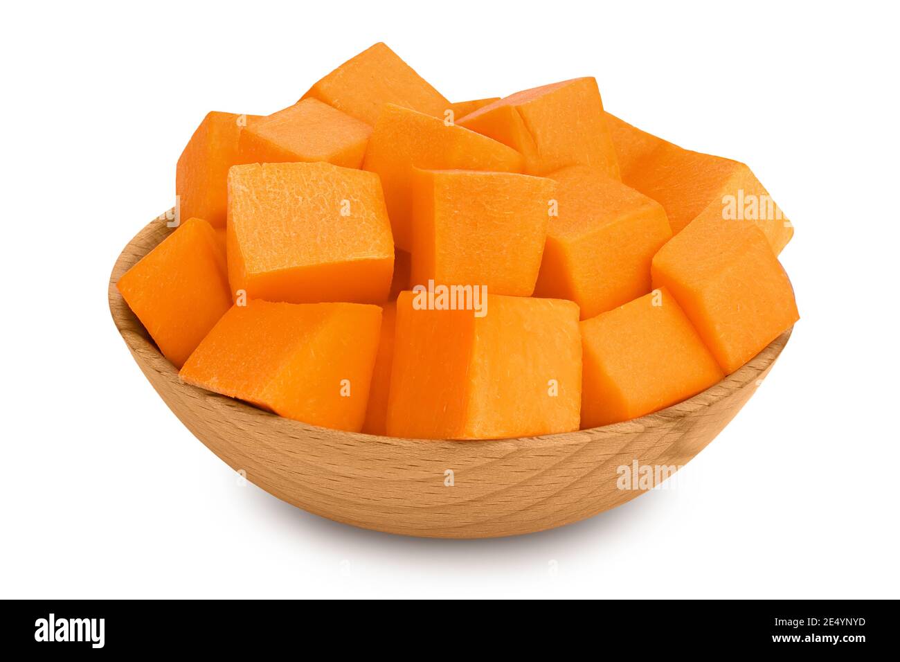 butternut squash diced in wooden bowl isolated on white background with ...