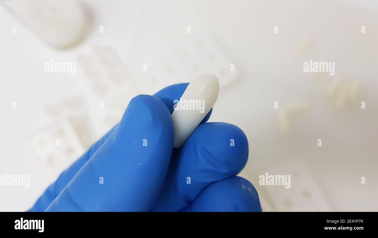 Closeup shot of a scientist's or researcher's hand holding ...