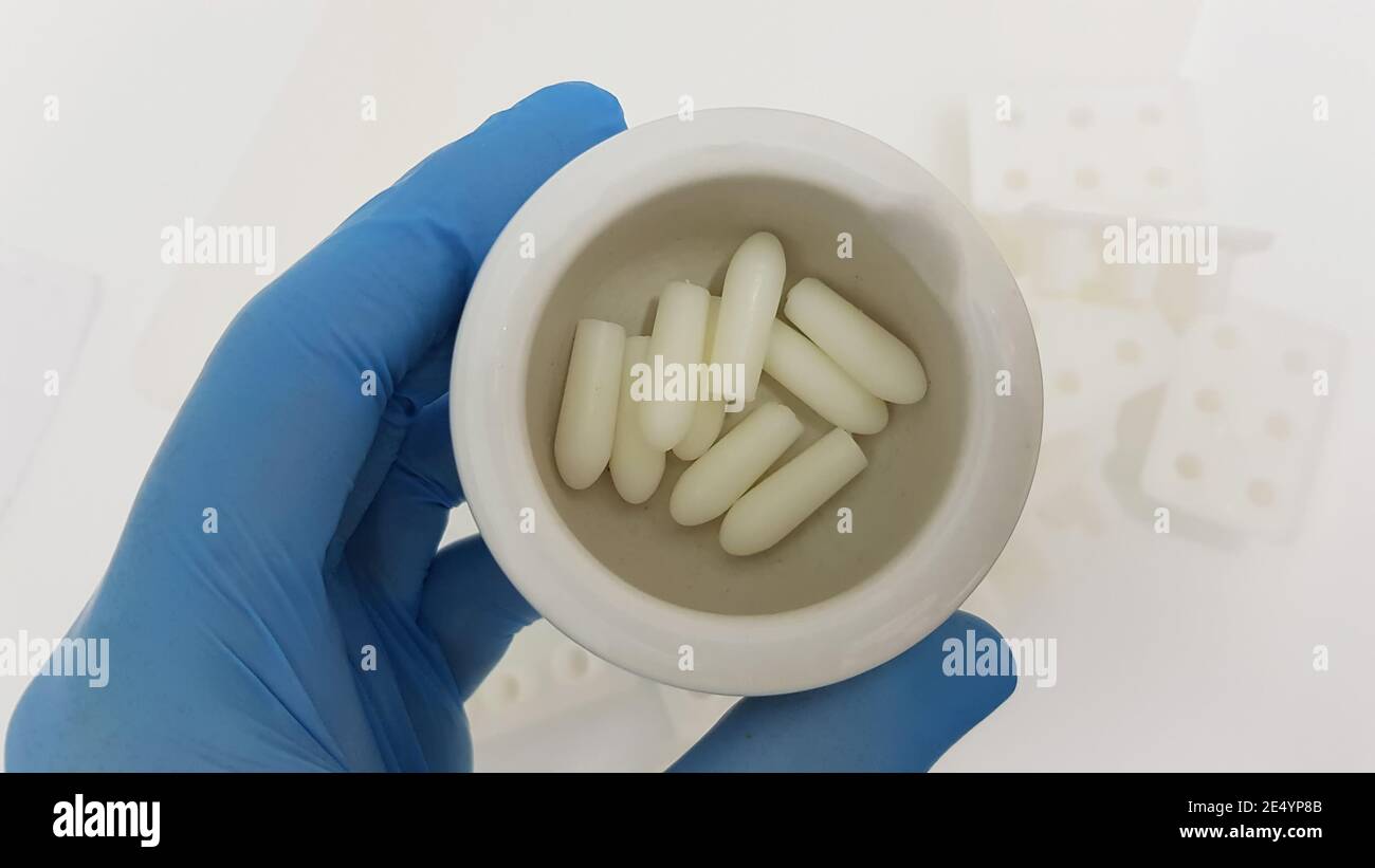 Closeup shot of a scientist's or researcher's hand holding ...