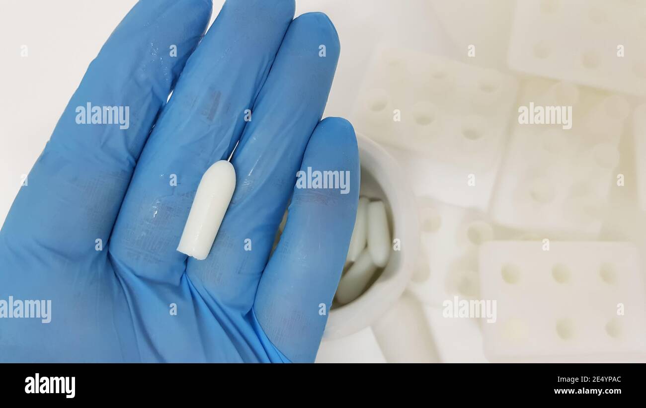 Closeup shot of a scientist's or researcher's hand holding ...