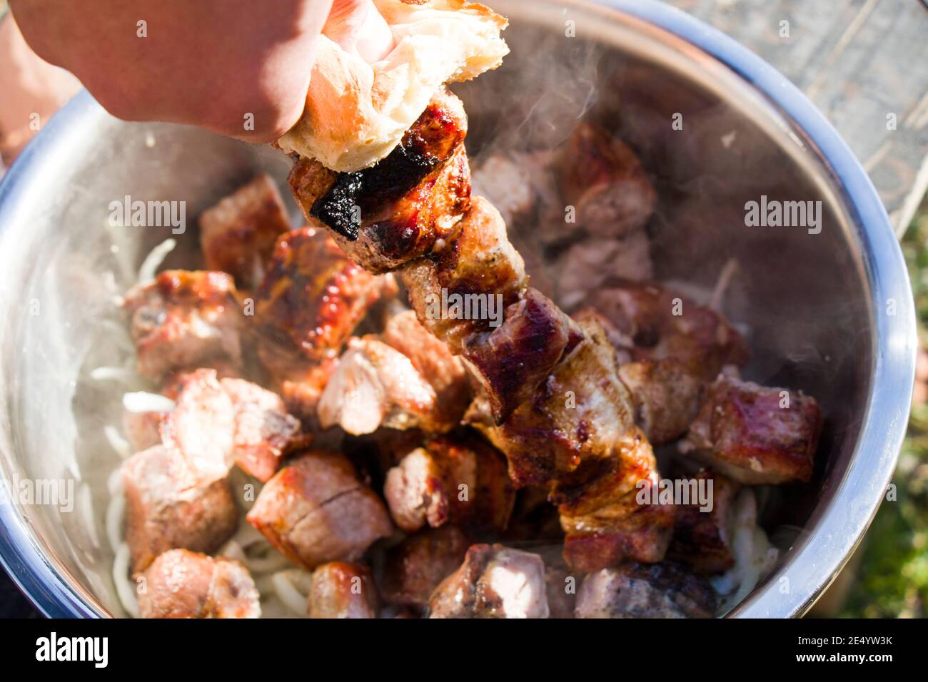 Georgian traditional dish, Mtsvadi on the fire, raw meal on the grill ...