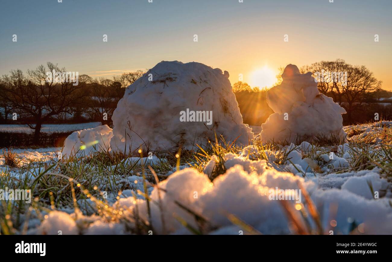 Snow and snow balls on a field of Harrow Weald in a sunny morning ...