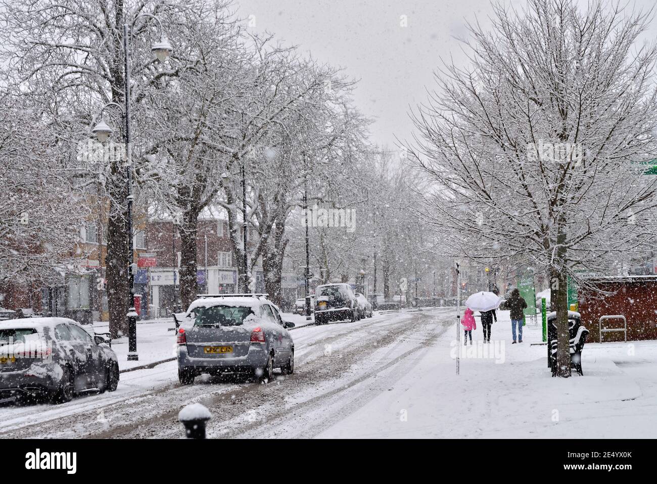 Heavy snowfall in a suburban high street, Shepperton Surrey England UK ...