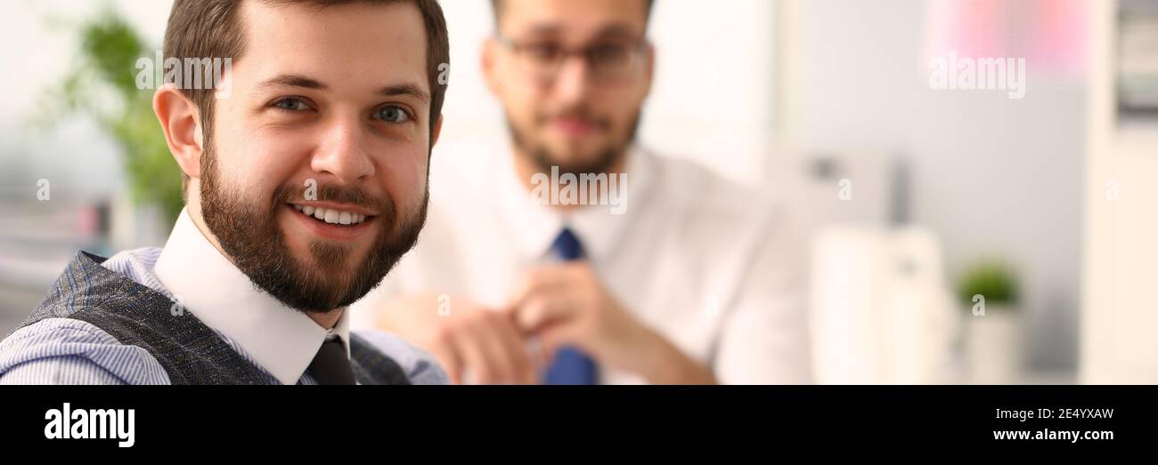 Happy office workers sit in hi-res stock photography and images - Alamy