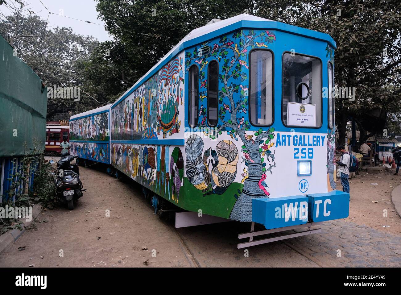 Artistic graffiti painted on the body of a tram, one of the vintage ...