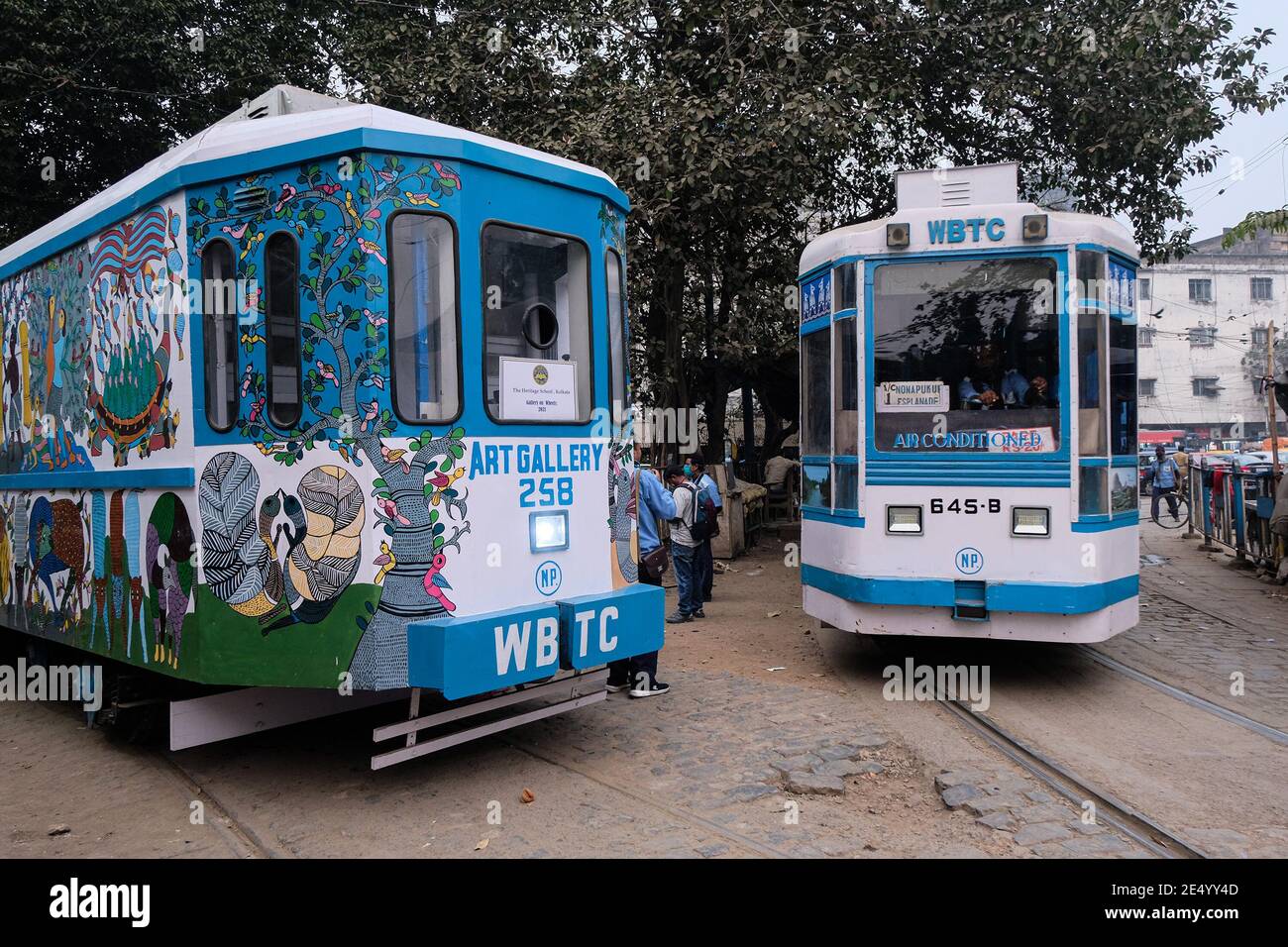 Artistic graffiti painted on the body of a tram, one of the vintage ...