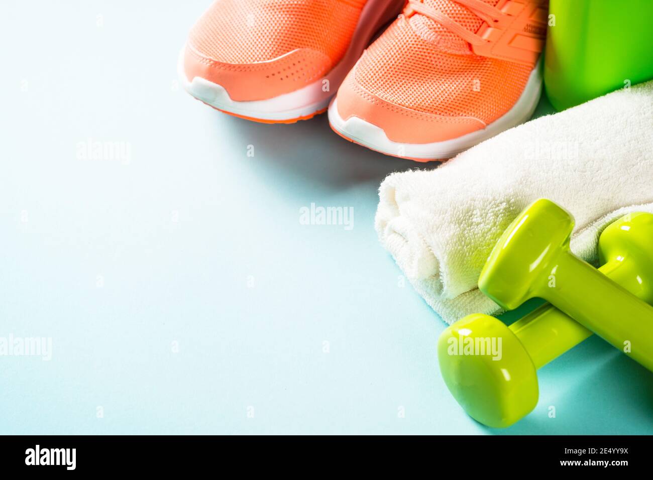 Fitness equipment at blue background top view Stock Photo - Alamy