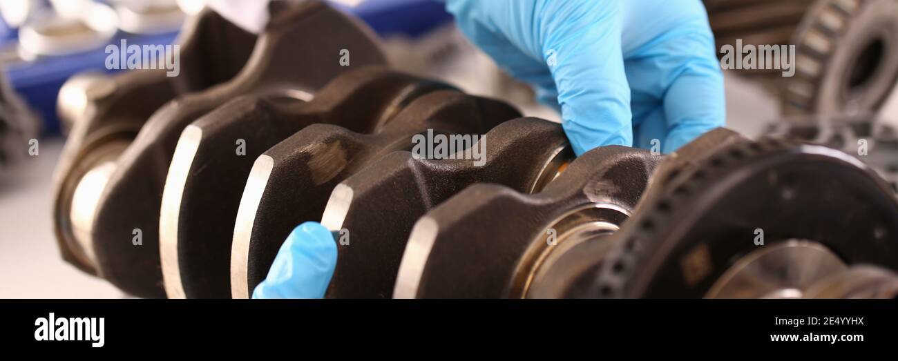Car engineer holding a part hi-res stock photography and images - Alamy