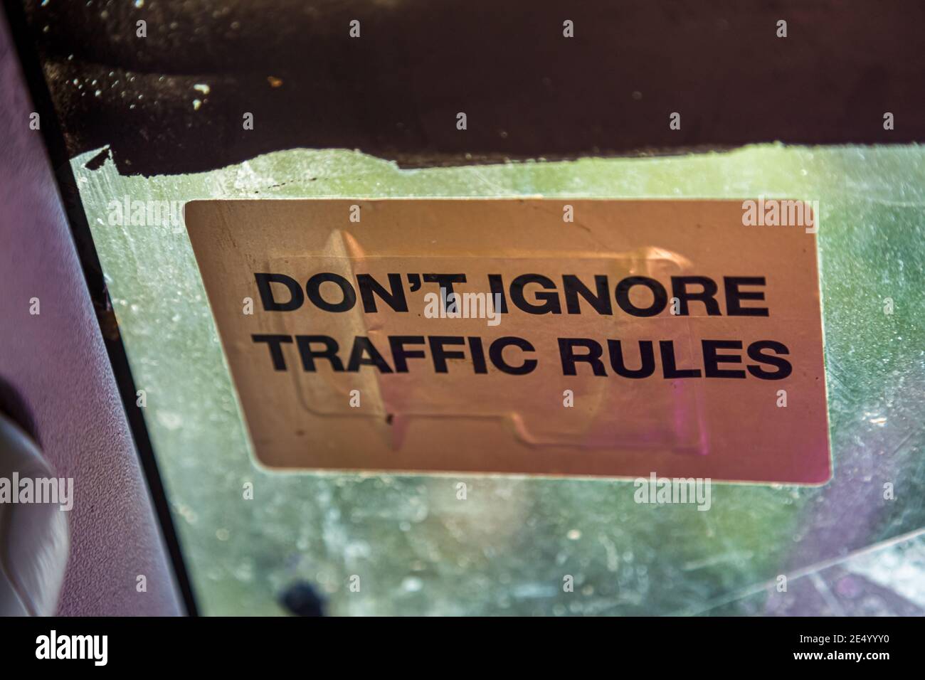 Sticker on the windshield of a taxi in Papua New Guinea: "Don't ignore ...