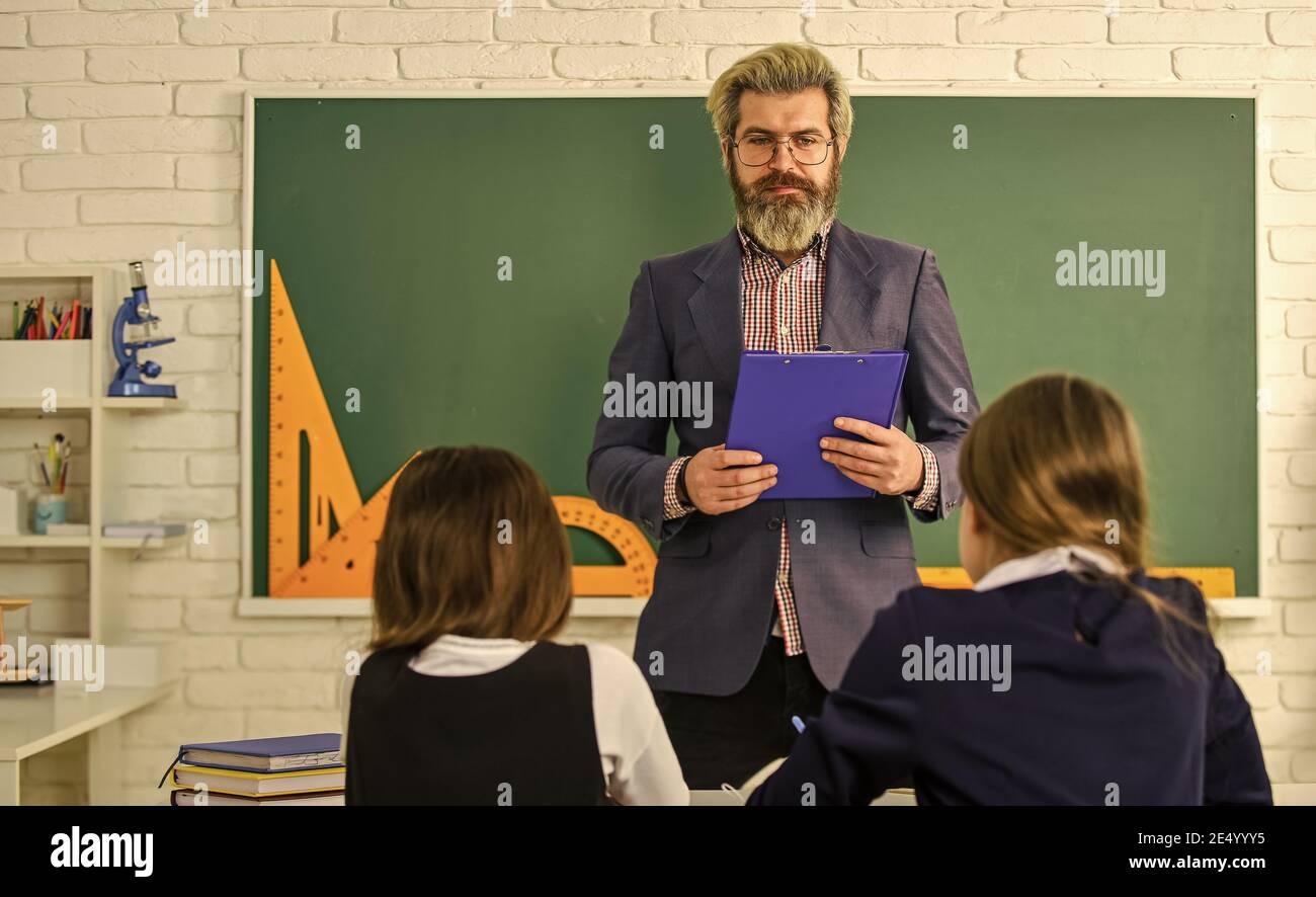 Teacher and kids Classroom. Discussion group of children and teacher ...