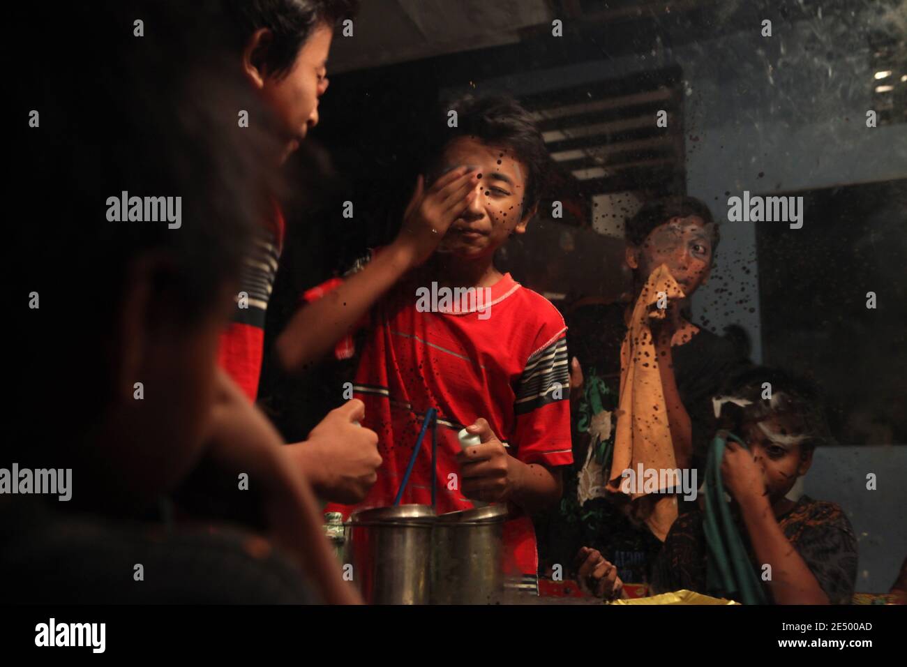 Young performers wash make-up off after the wayang orang performance ...