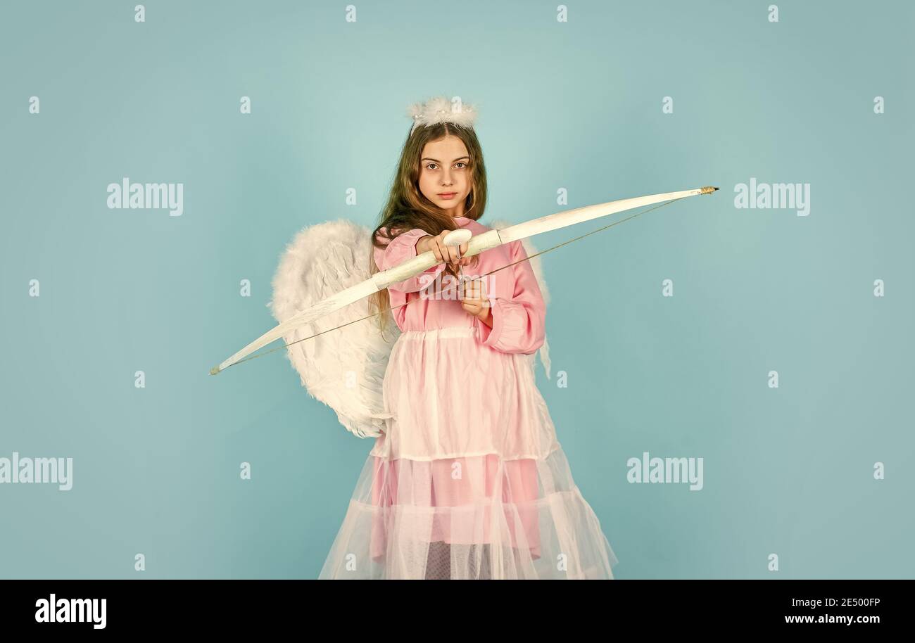 True love. girl cupid hold bow and arrow. cupids arrow hit right in ...