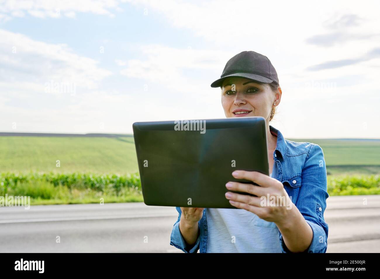 Smart farming and digital agriculture, female agricultural worker with ...
