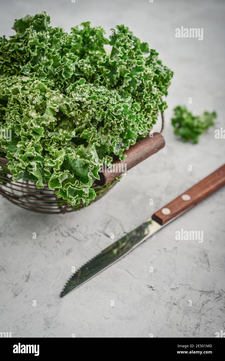 Curly kale in basket hi-res stock photography and images - Alamy