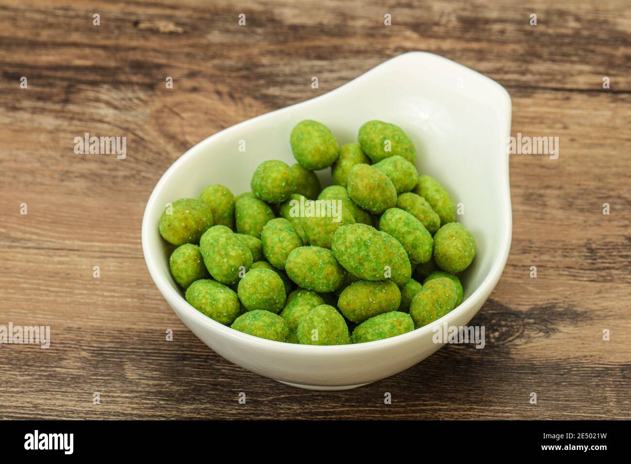 Spicy wasabi peanuts snack in the bowl Stock Photo - Alamy