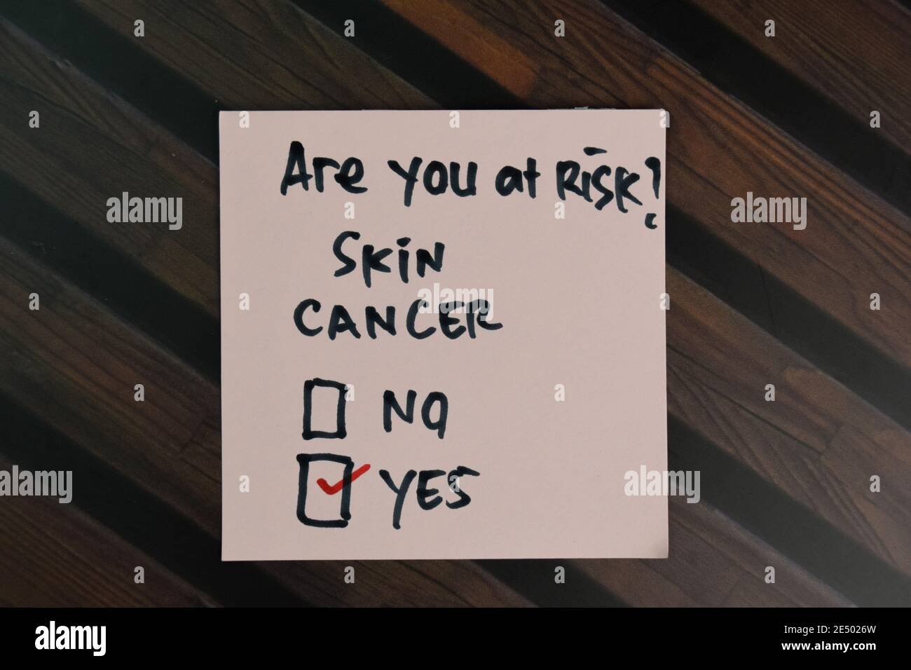 Skin Cancer write on sticky notes and supported by additional services ...