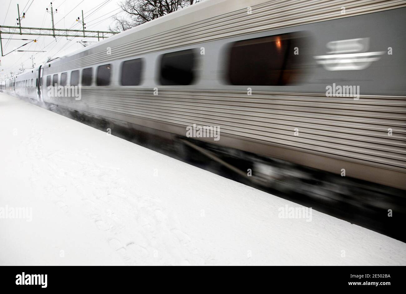 VIKINGSTAD, SWEDEN- 15 DECEMBER 2012: SJ's train SJ 2000 (X2000) on a ...