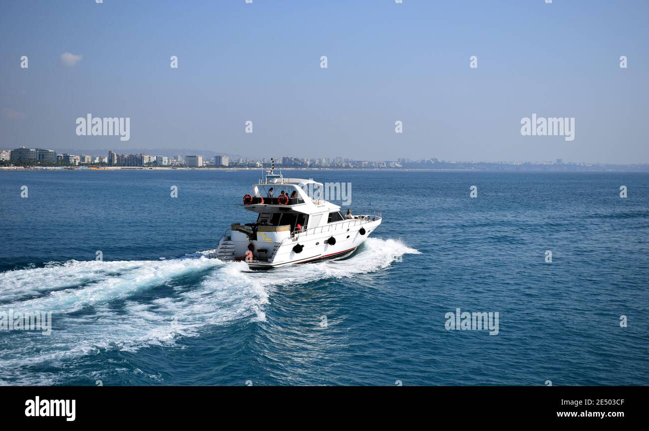 Motor-launch on the Mediterranean Sea. View of a luxury yacht. ANTALYA ...