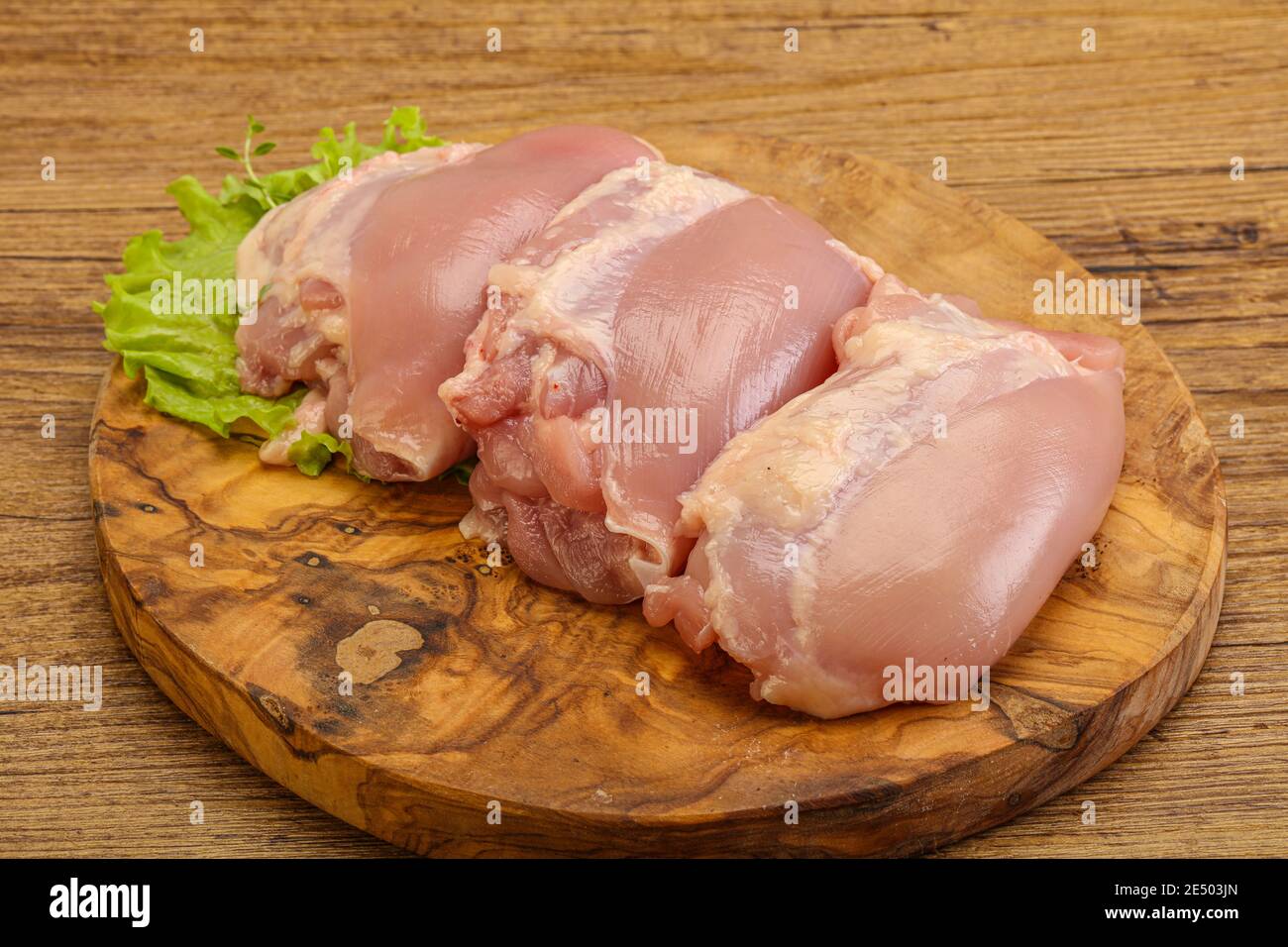 Raw chicken boneless and skinless leg for cooking Stock Photo - Alamy
