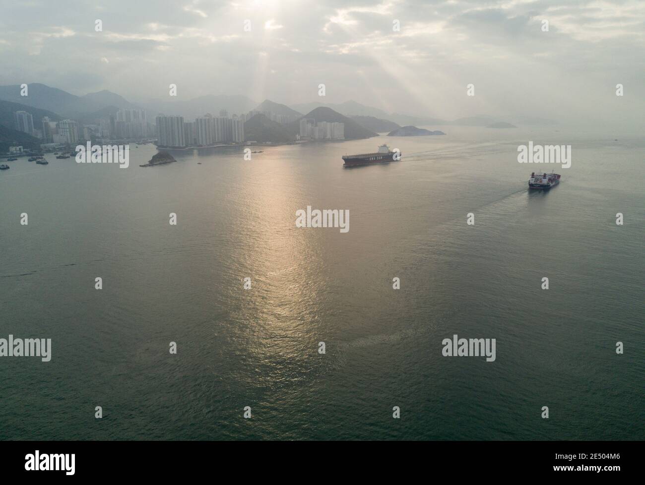 Aerial view of a container ship passing through the Lamma shipping ...