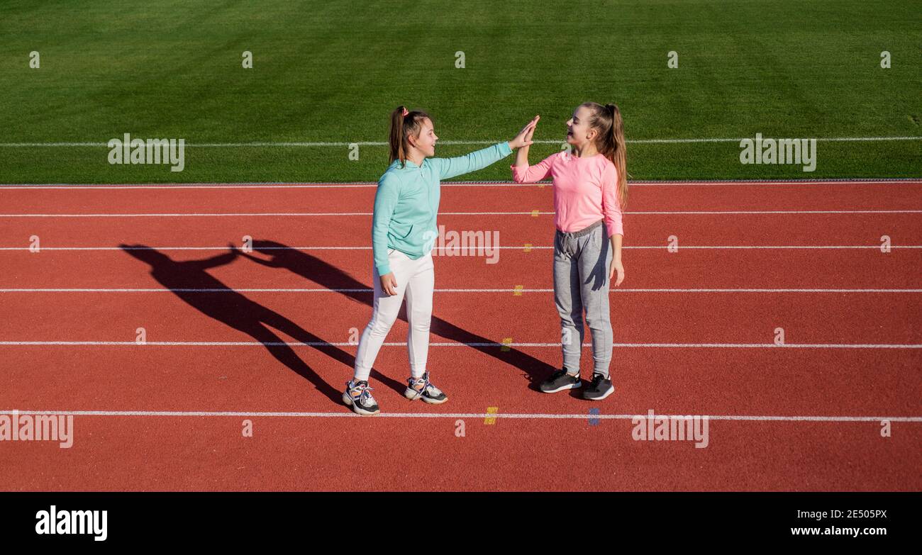 Teenage girls racing track hi-res stock photography and images - Alamy