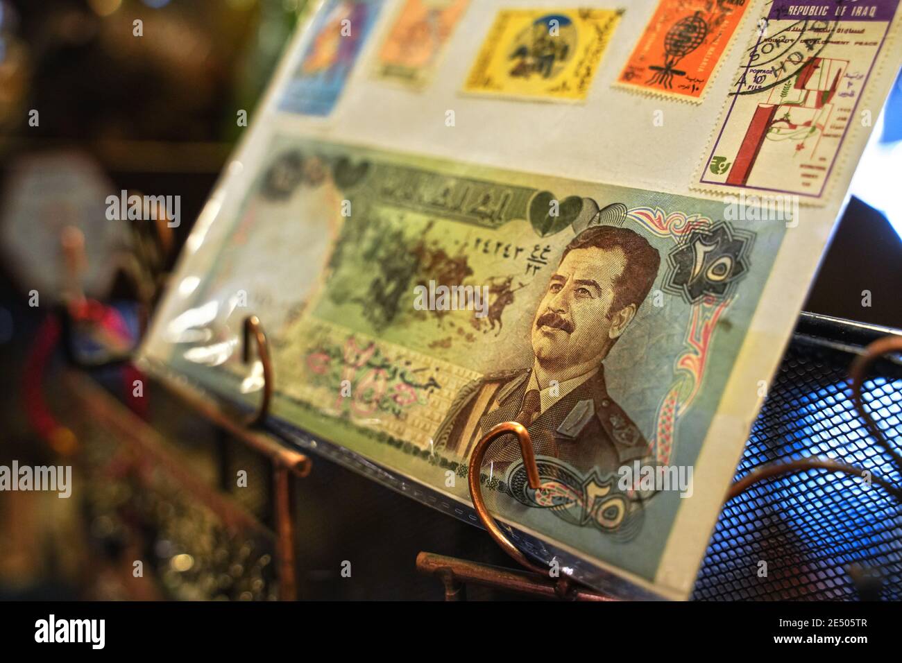 Aqaba, Jordan - January 17, 2020: Saddam Hussein portrait on vintage 25 ...
