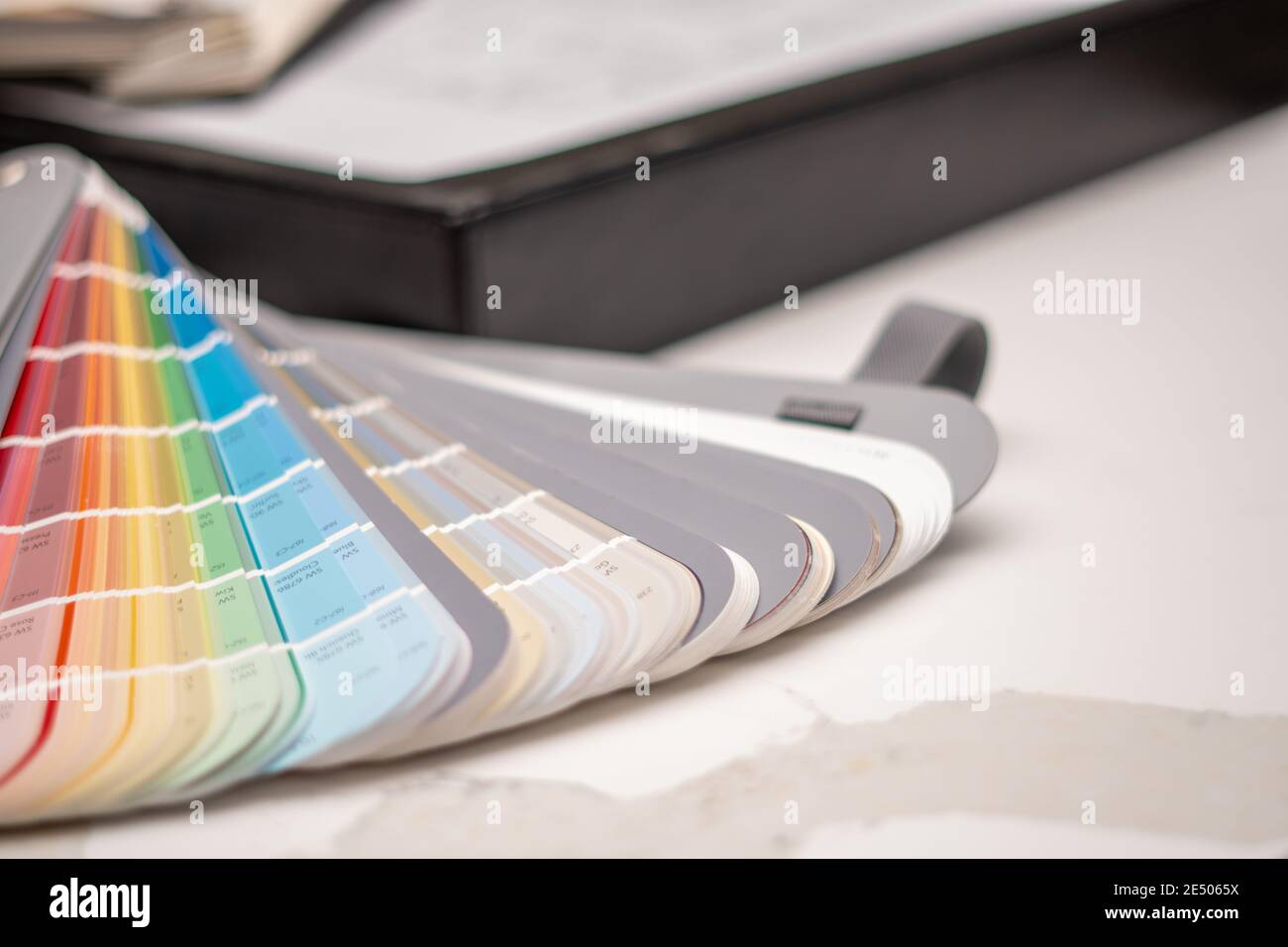 Interior designer's working table, an architectural plan of the house ...