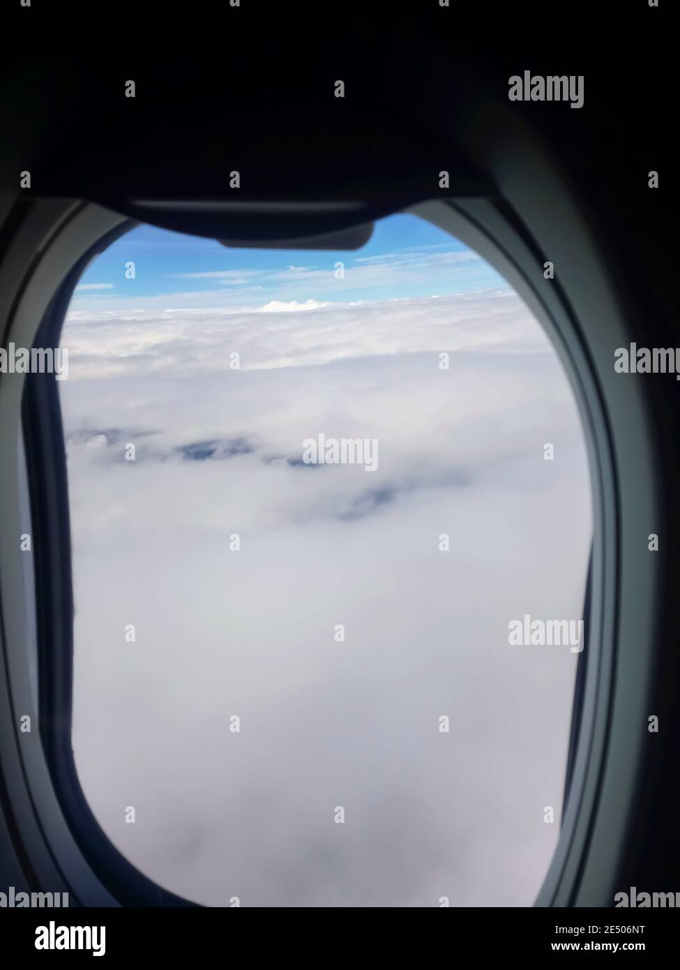 Aerial view from airplane window with amazing clouds skyline Stock ...