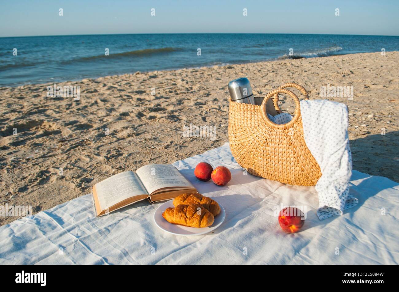 Summer picnic on the beach by the sea at a sunrise Stock Photo - Alamy