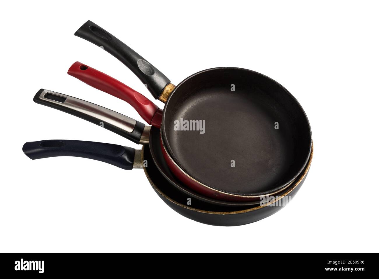 Stack of old scratched used pans isolated on white background Stock ...