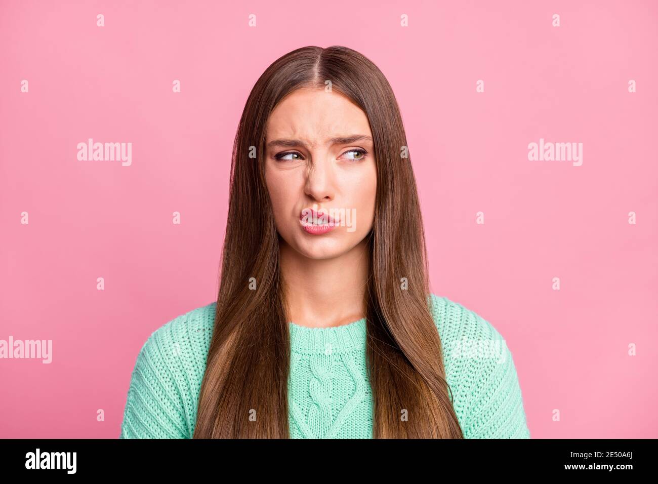 Photo of displeased pretty young woman look empty space dislike smell ...