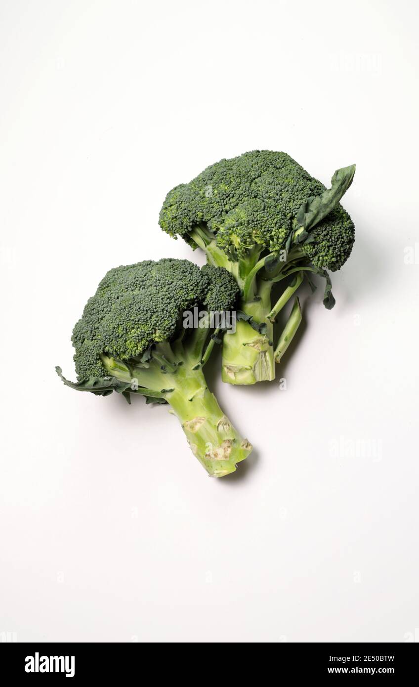 Broccoli isolated on white background. Top view Stock Photo - Alamy