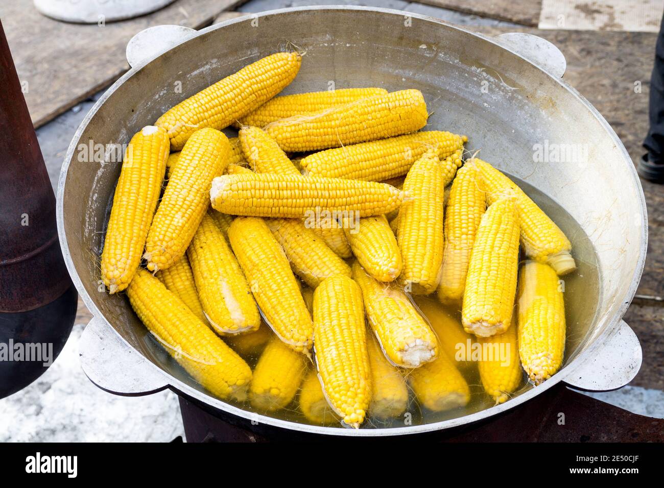 Cooking corn. Many of yellow corn in the tank Stock Photo - Alamy