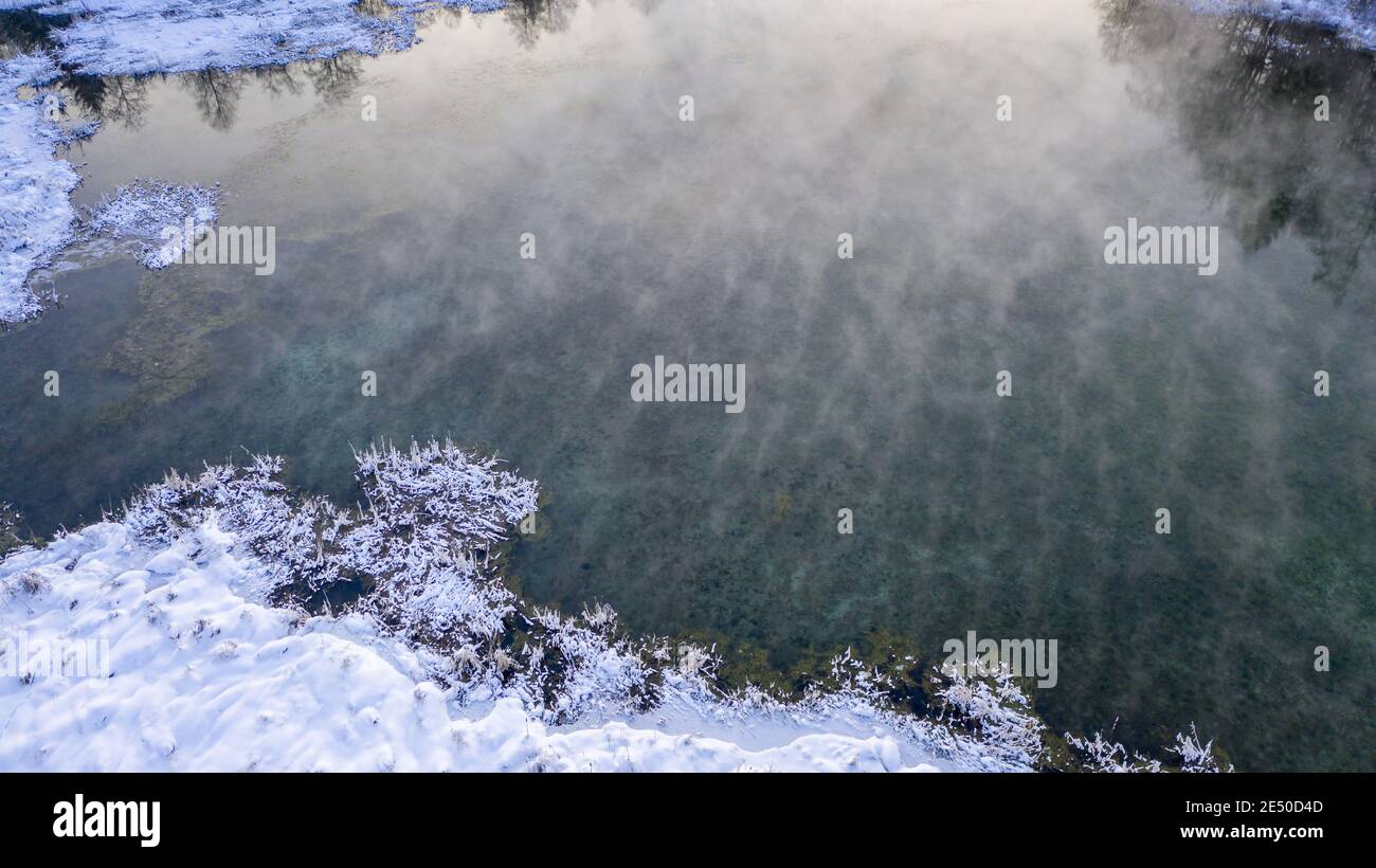 Beautiful scenery of the natural groundwater spring with the heavily ...