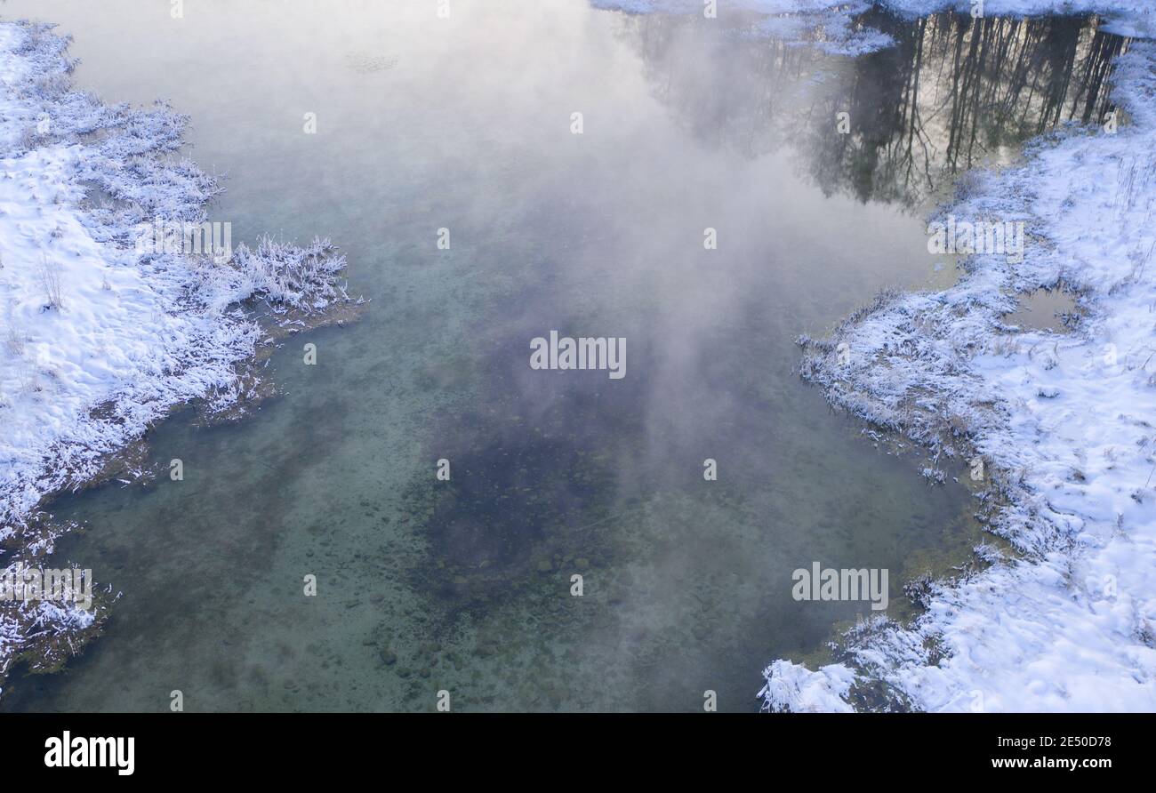 Beautiful scenery of the natural groundwater spring with the heavily ...